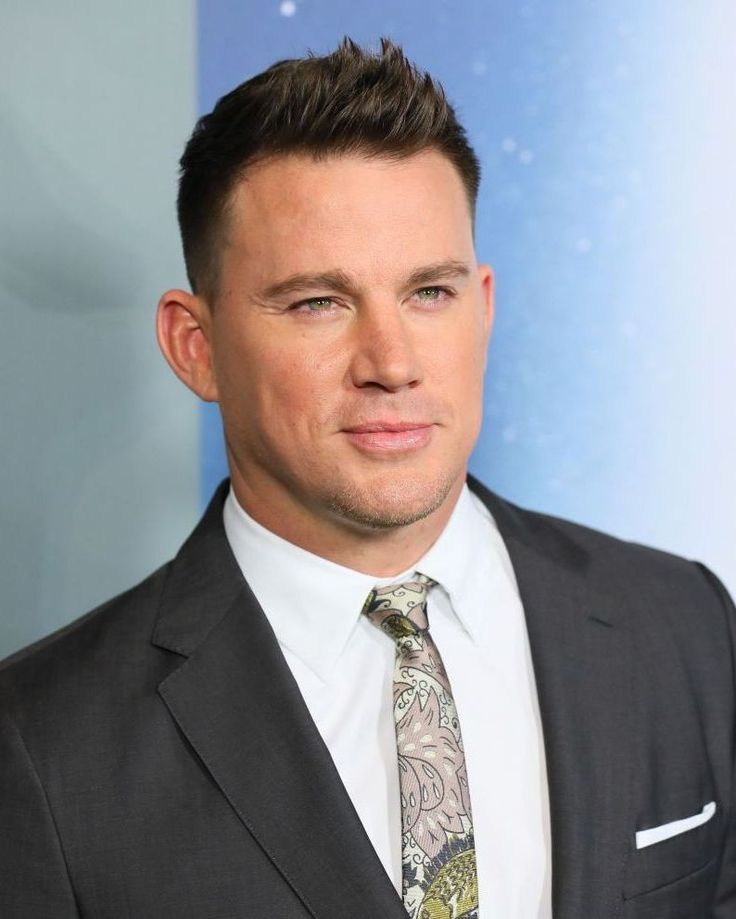 Round faced model with short faux-hawk buzz cut